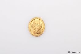 golden ADAC Eagle dashboard badge